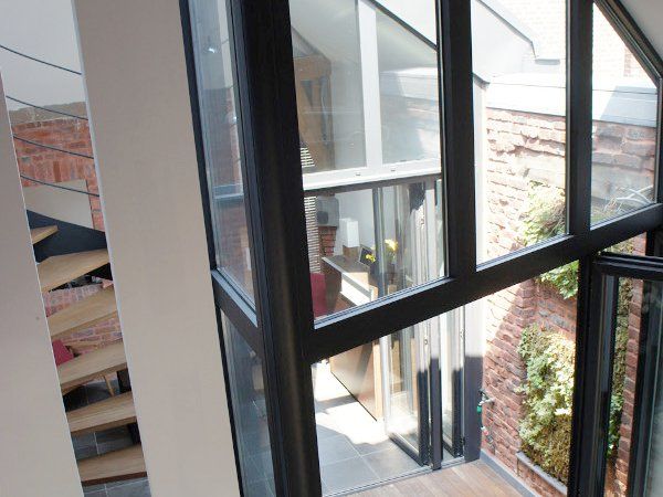 1 appartement devient duplex avec patio - Maison à part